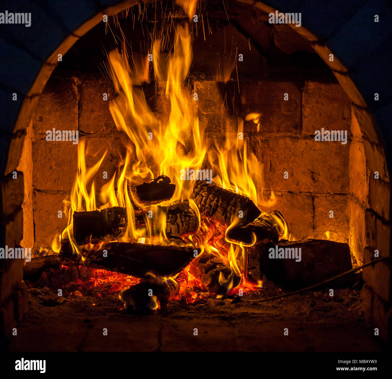 A fire burns in a fireplace Stock Photo - Alamy