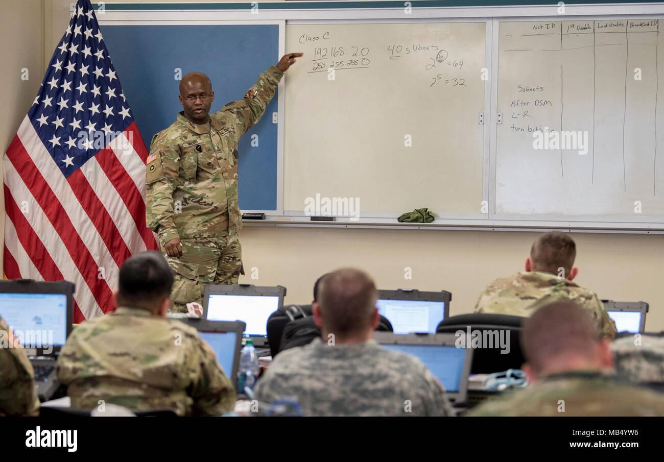 Sgt. 1st Class Rodrick Webb teaches a class on information systems ...