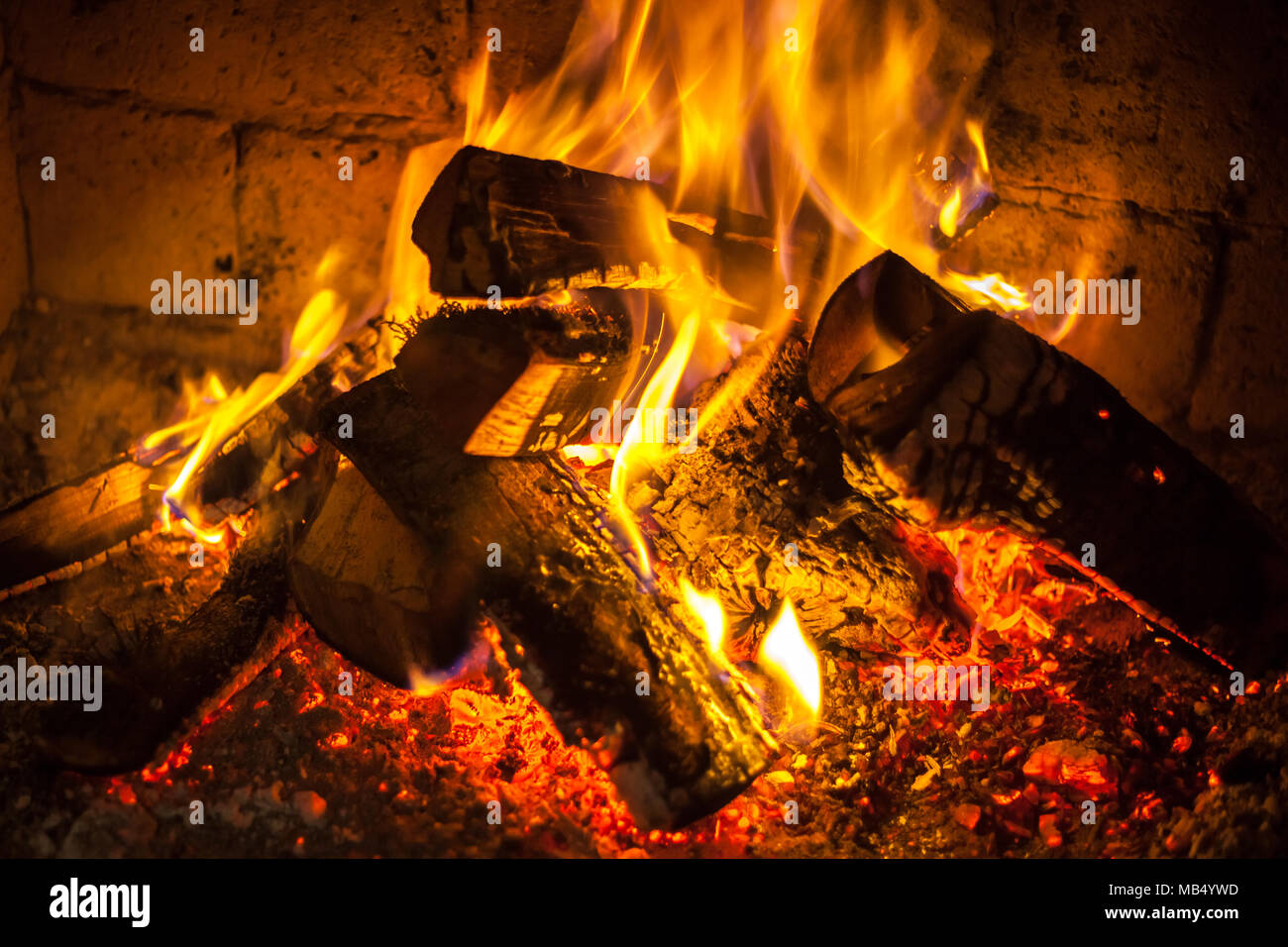 A fire burns in a fireplace Stock Photo - Alamy