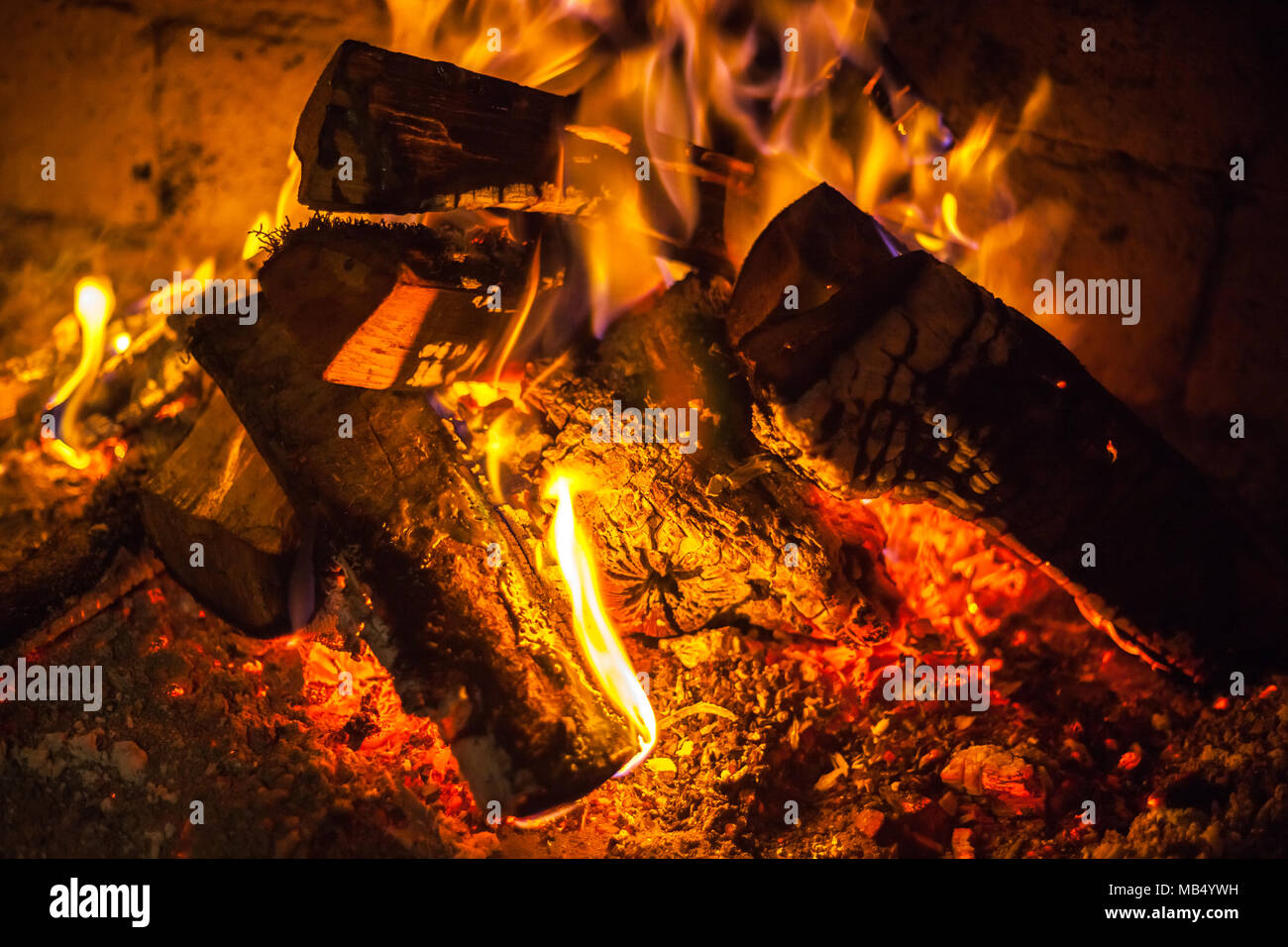 A fire burns in a fireplace Stock Photo - Alamy