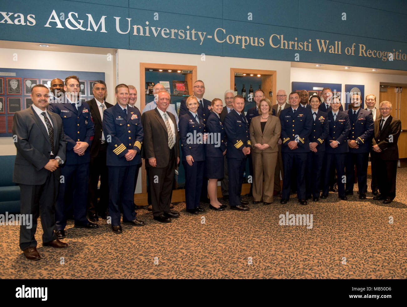 Coast Guard and Texas A&M University-Corpus Christi officials pose for ...