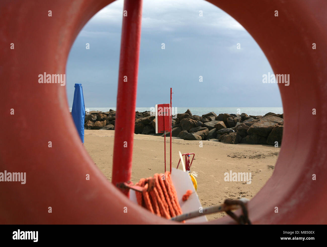 Beach safety items from red rescue donut Stock Photo - Alamy
