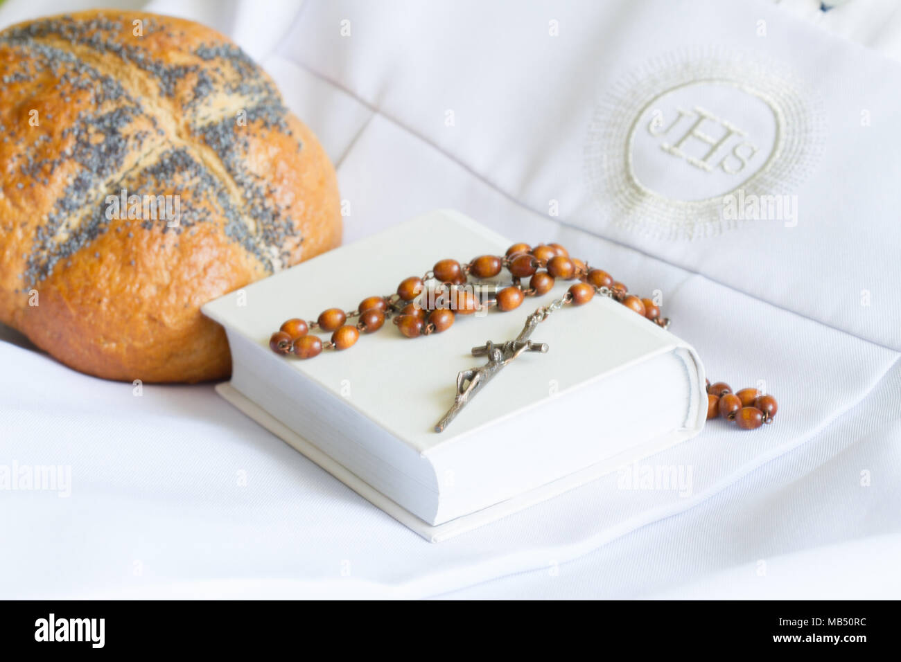First holy communion symbol background concept with rosary and flowers ...
