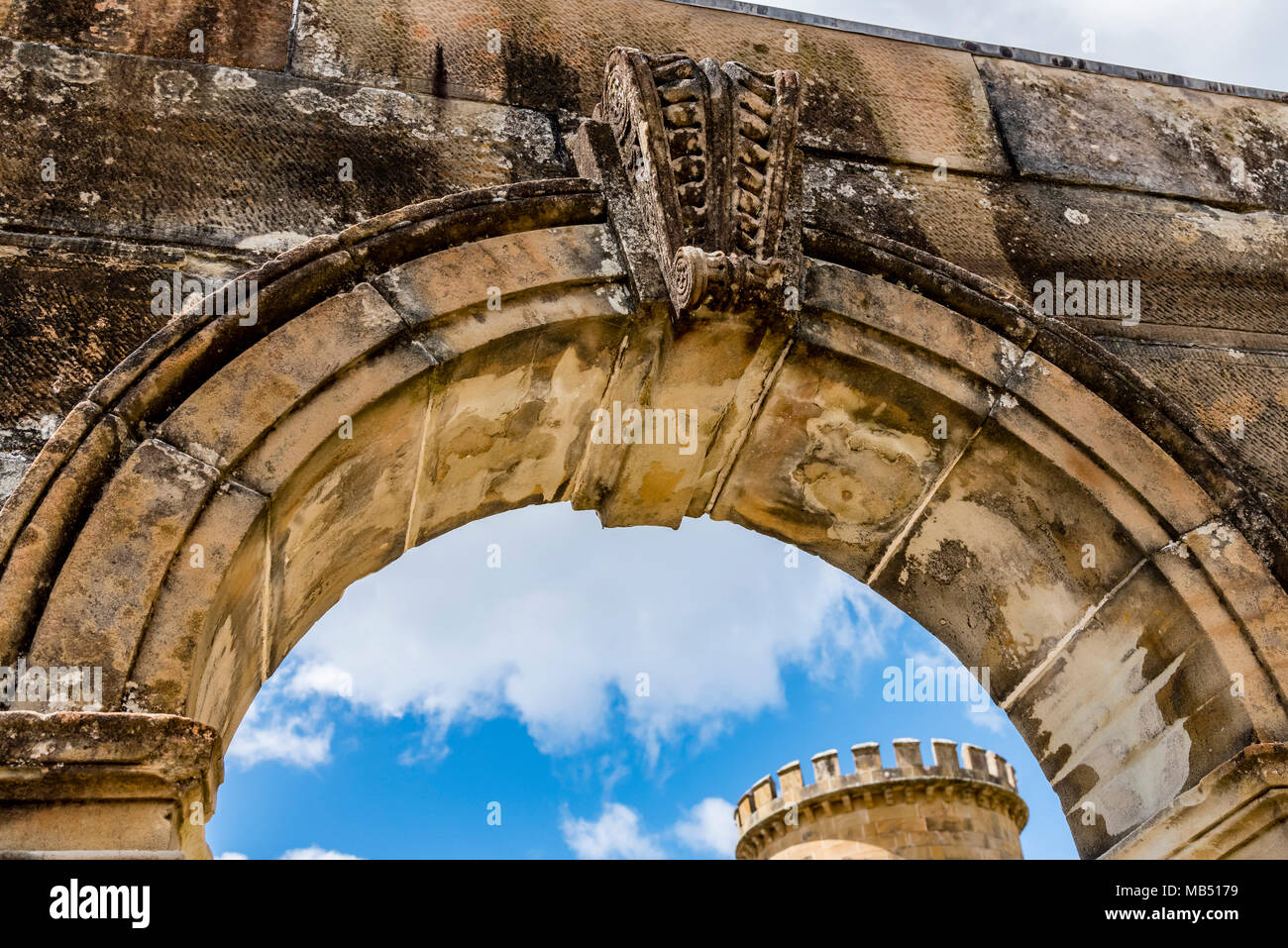 Architectural details of old buildings, cloudy sky in background. Ruins ...