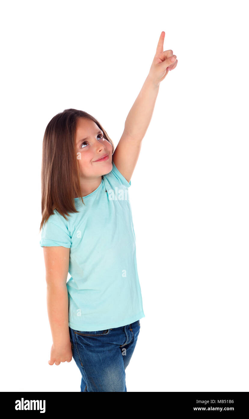 Cute child girl pointing with his finger isolated on white background ...