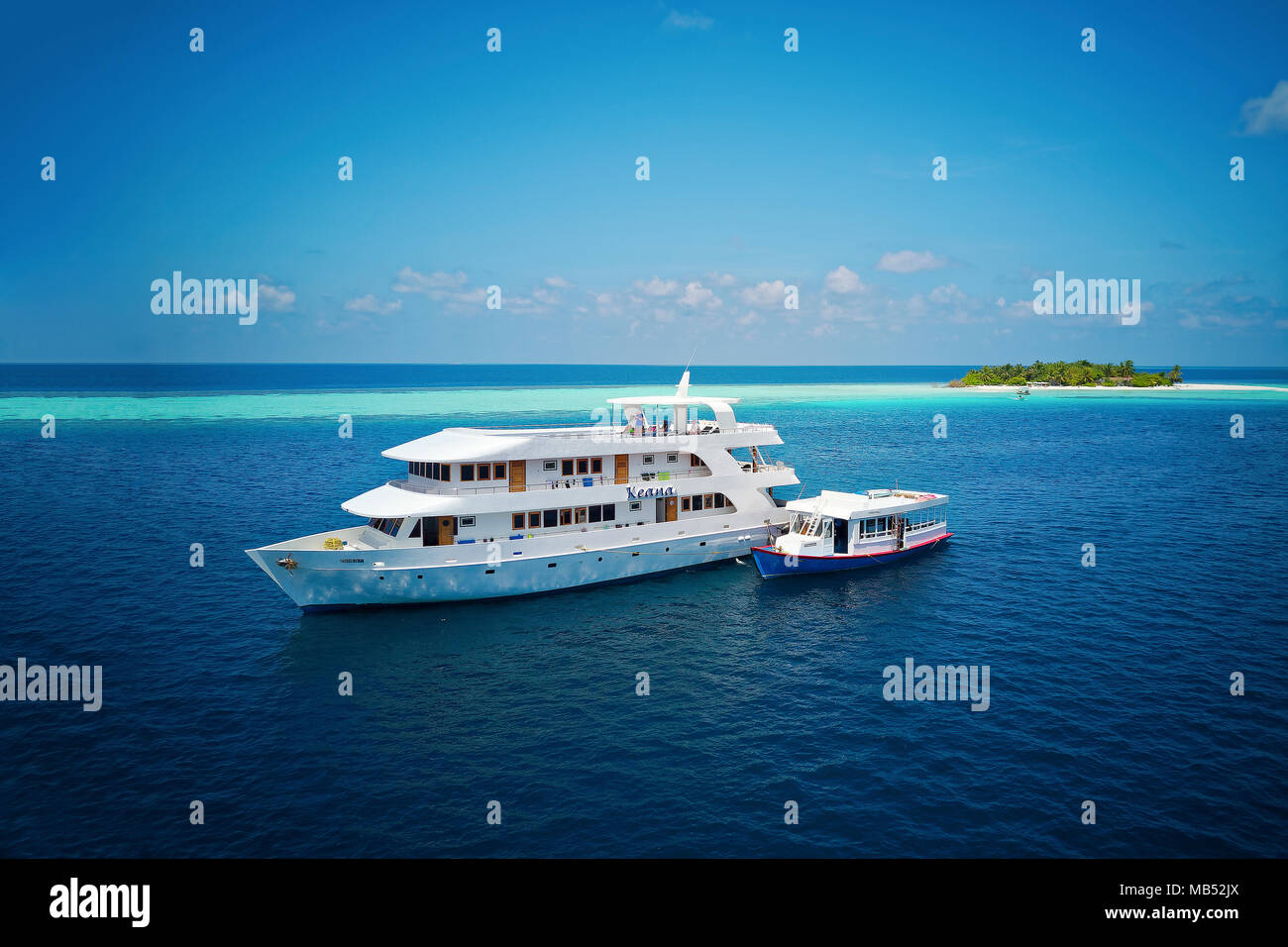 Diving safari ship MS Keana with diving dhoni anchored off an ...
