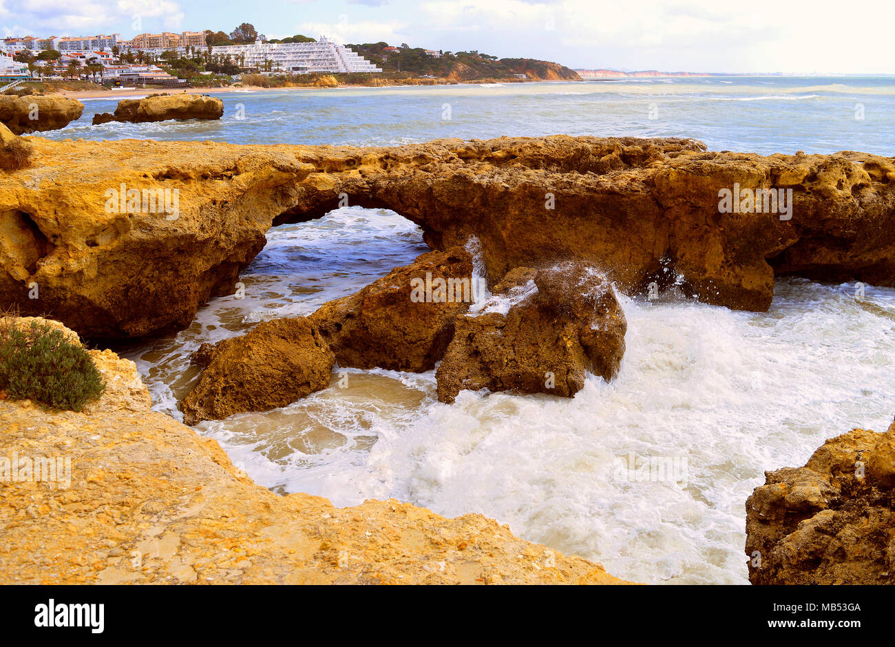 Rock erosion from the sea on Auramar beach in Albufeira Stock Photo - Alamy