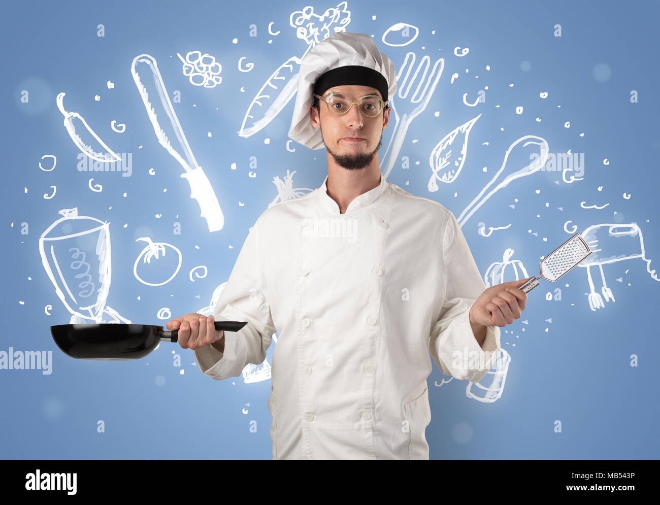 Young cook with kitchen instruments and drawn recipe concept on ...