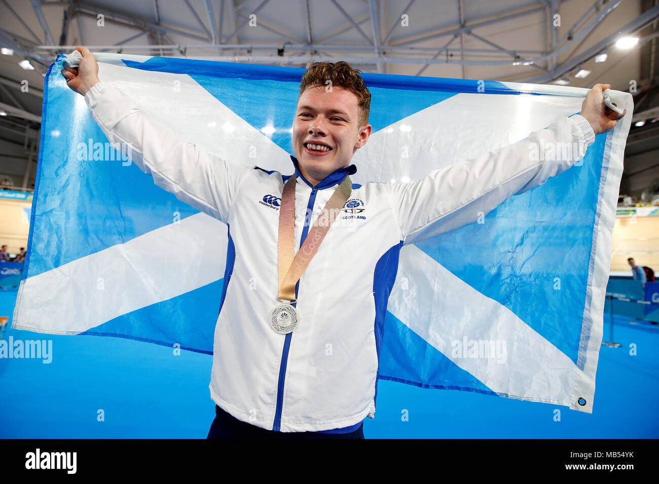 Scotland's Jack Carlin celebrates with his silver medal and flag after ...