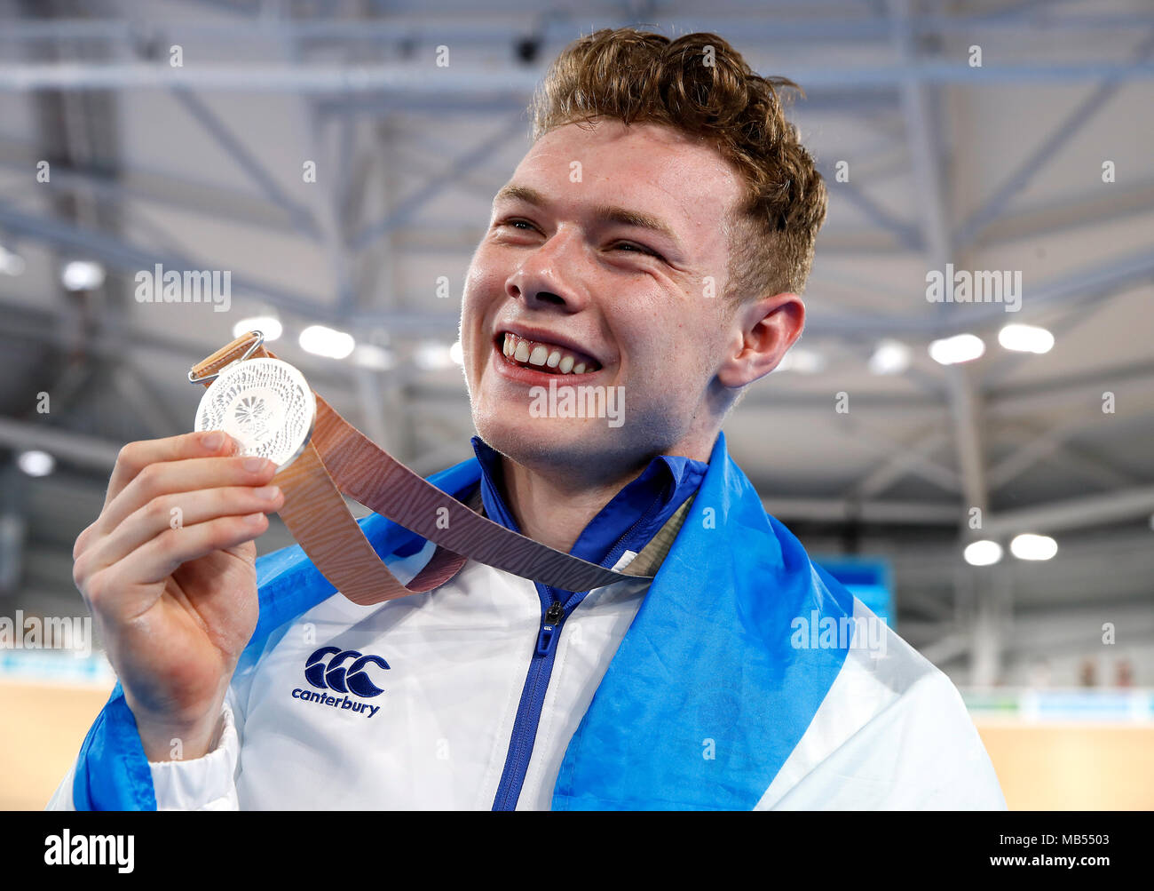 Scotland's Jack Carlin celebrates with his silver medal and flag after ...