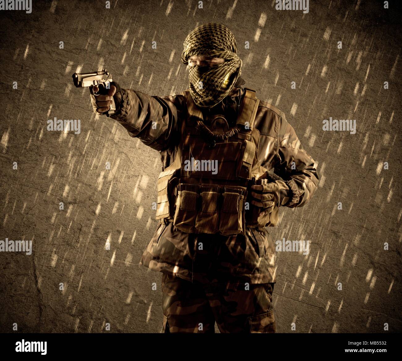 Portrait of dangerous heavily armed terrorist soldier with mask on ...