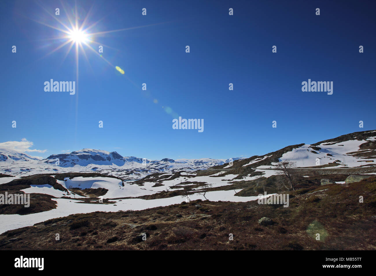 Spring valley landscape with mountains and melting snow, Norway Stock ...