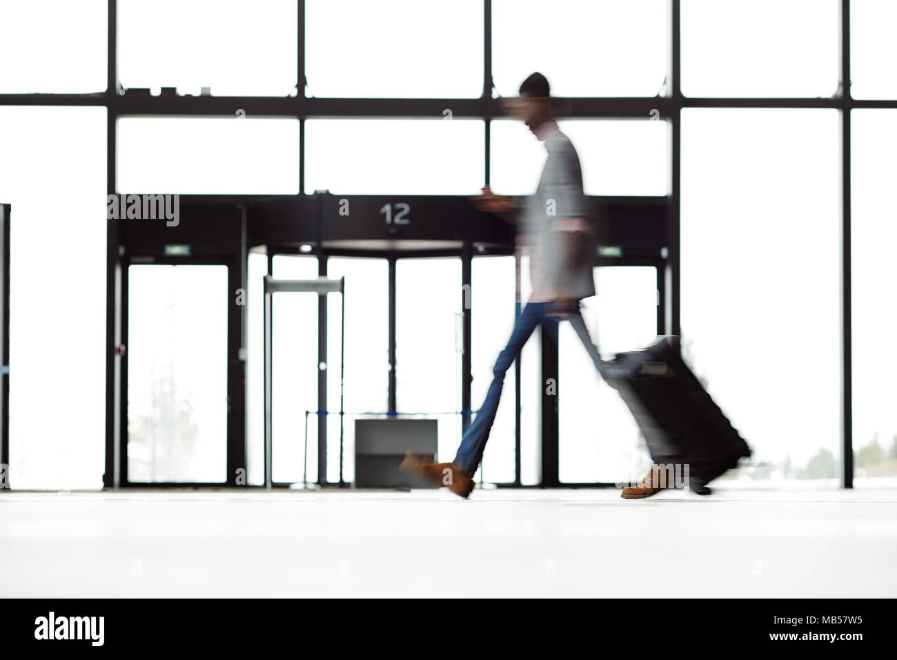 Person pulling suitcase moving hi-res stock photography and images - Alamy