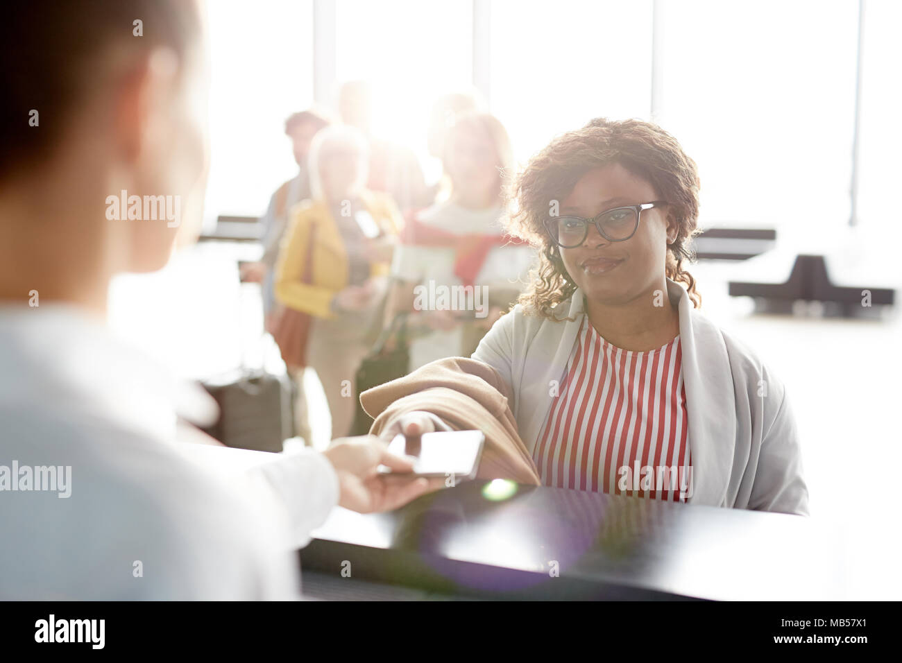 Check in back hi-res stock photography and images - Alamy