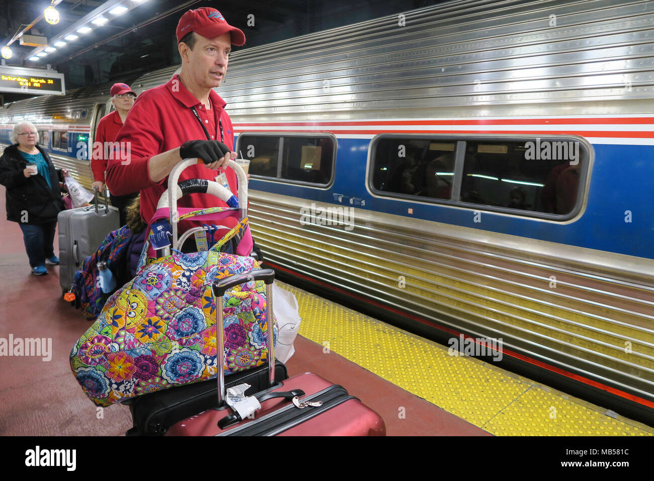 Red Cap and passengers, Train Platform, Penn Station, NYC Stock Photo ...