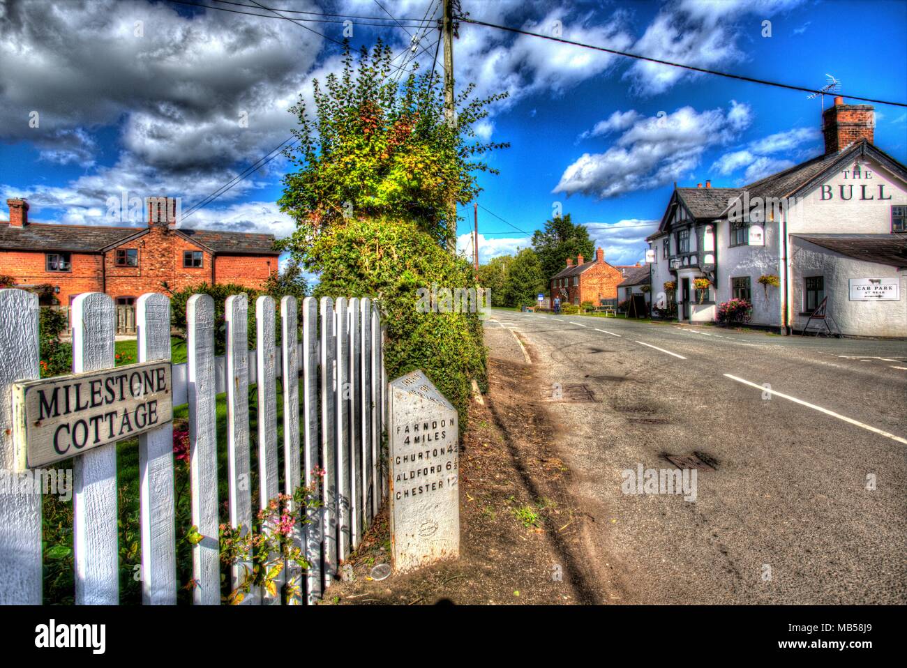 Village of Shocklach, Cheshire, England. Artistic view of the B5069 ...