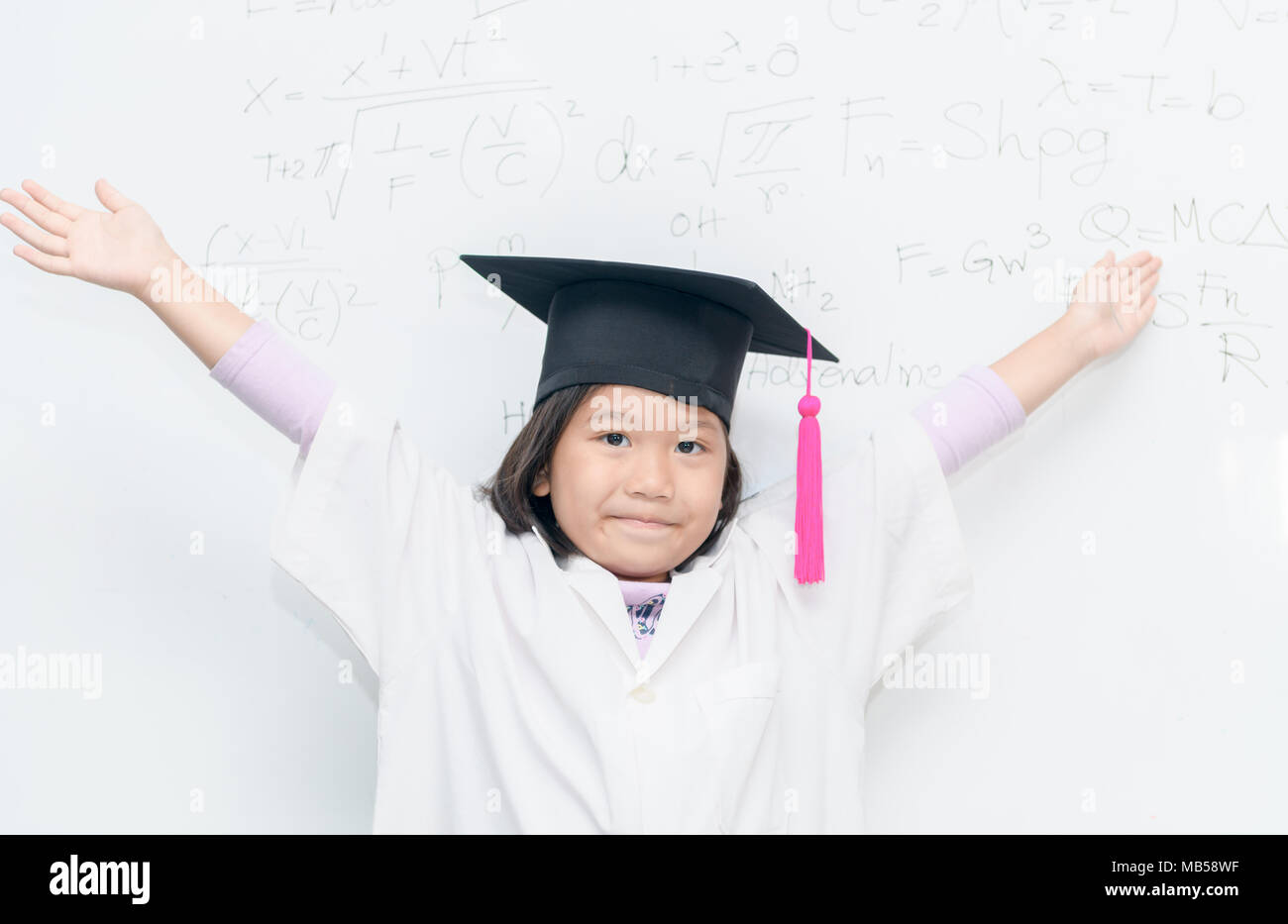 cute asian scientist girl wear graduation hat smile on white borad with ...