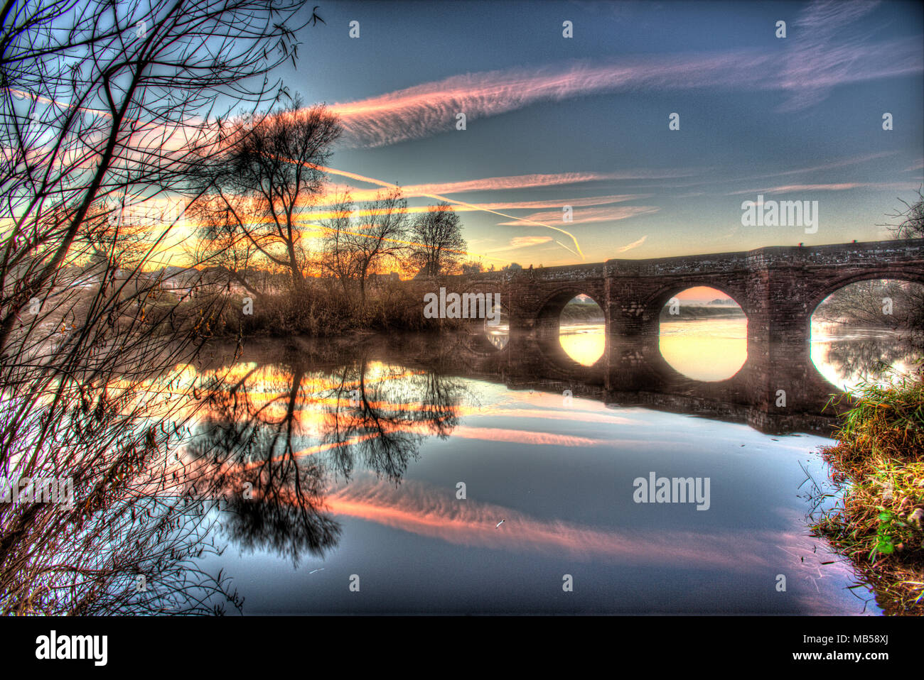 Village of Farndon, England. Artistic sunset view of the Grade 1 Listed ...