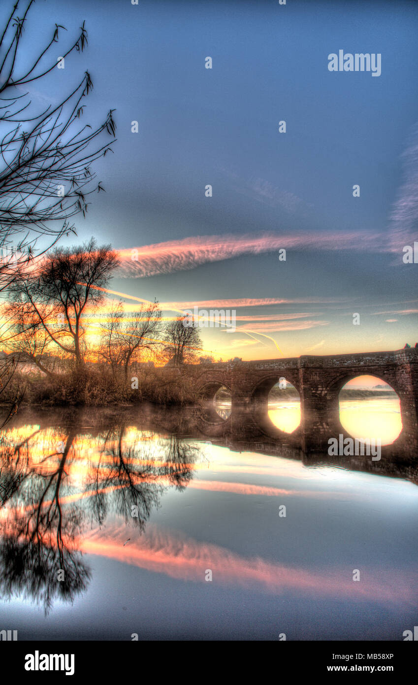 Village of Farndon, England. Artistic sunset view of the Grade 1 Listed ...
