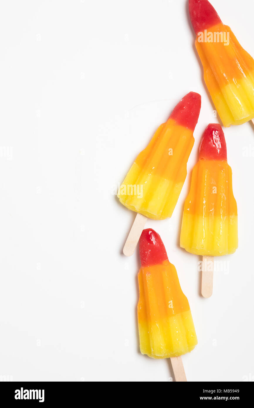 Rocket shaped ice lolly on a white background Stock Photo - Alamy