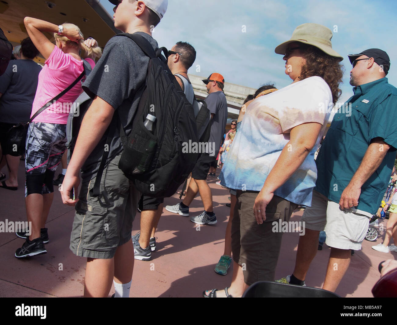 Walt Disney World visitors in queue at the entrance to Epcot Center ...