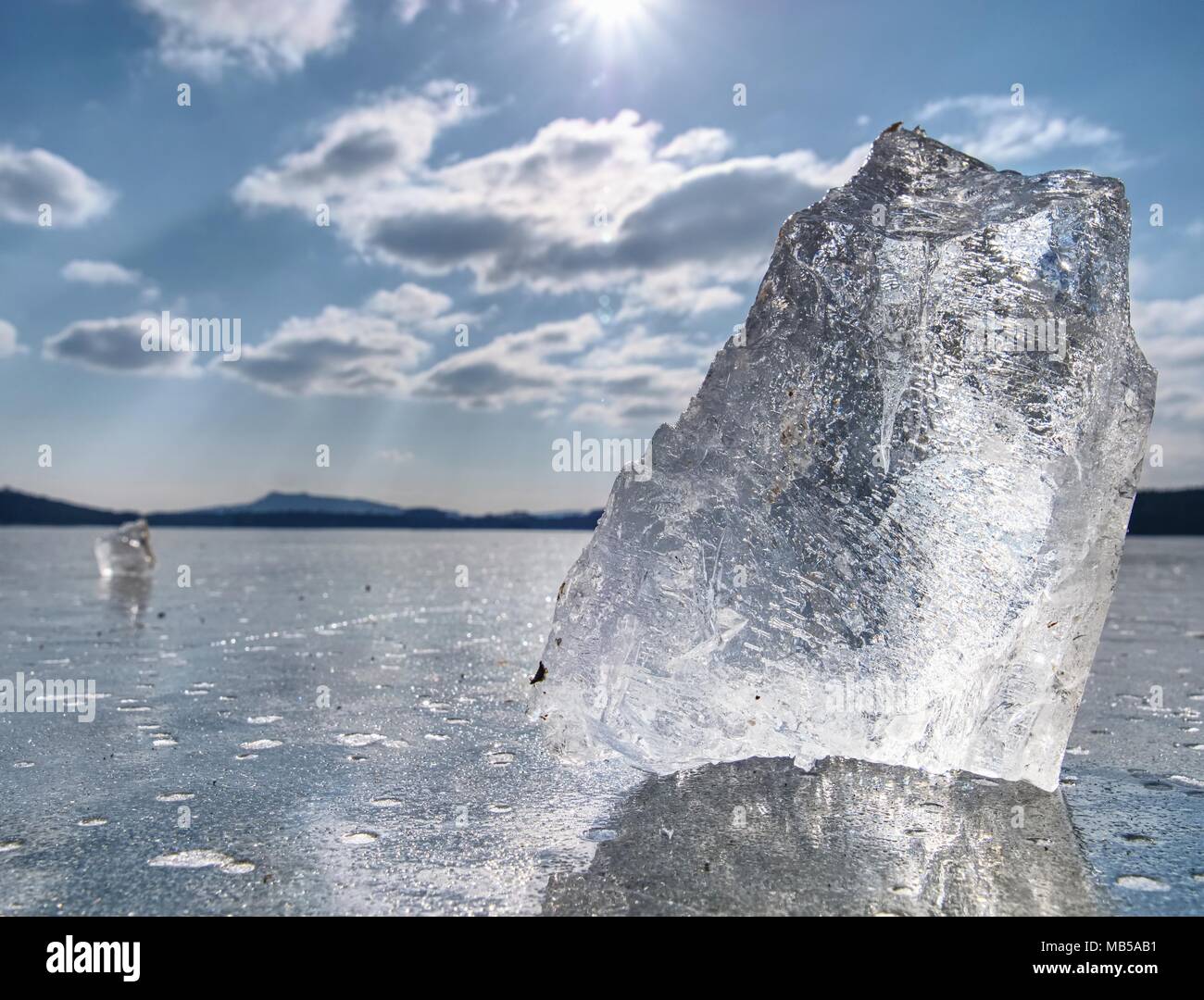 Shining broken ice. It beautifully shimmers the sun's rays, plays light ...