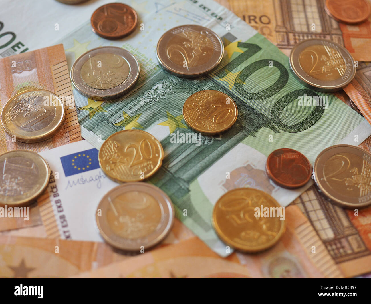 Euro banknotes and coins (EUR), currency of European Union Stock Photo ...