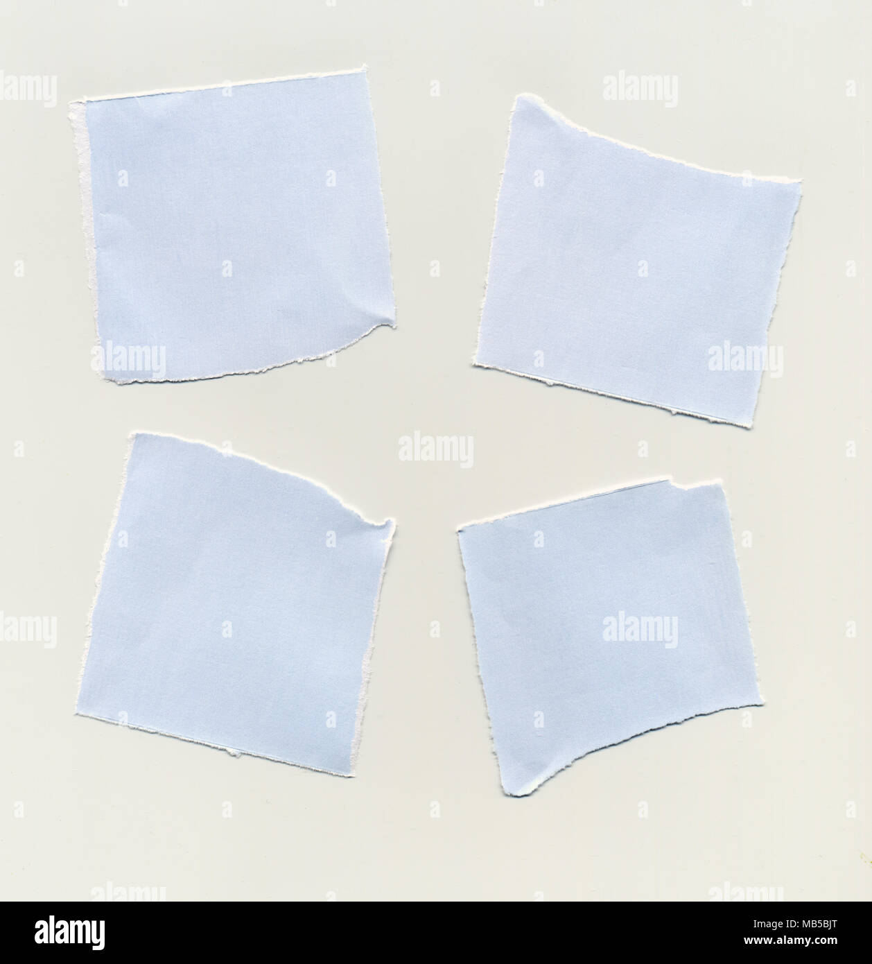 Torn paper note over light brown paper background Stock Photo - Alamy