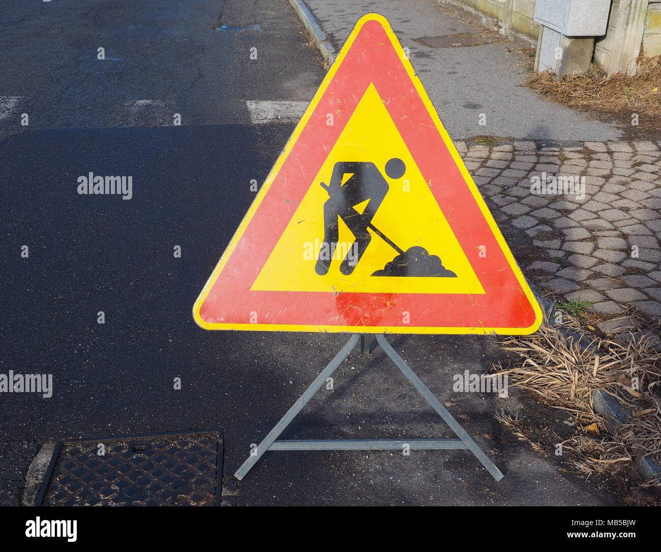 Warning signs, men at work road works traffic sign with copy space ...