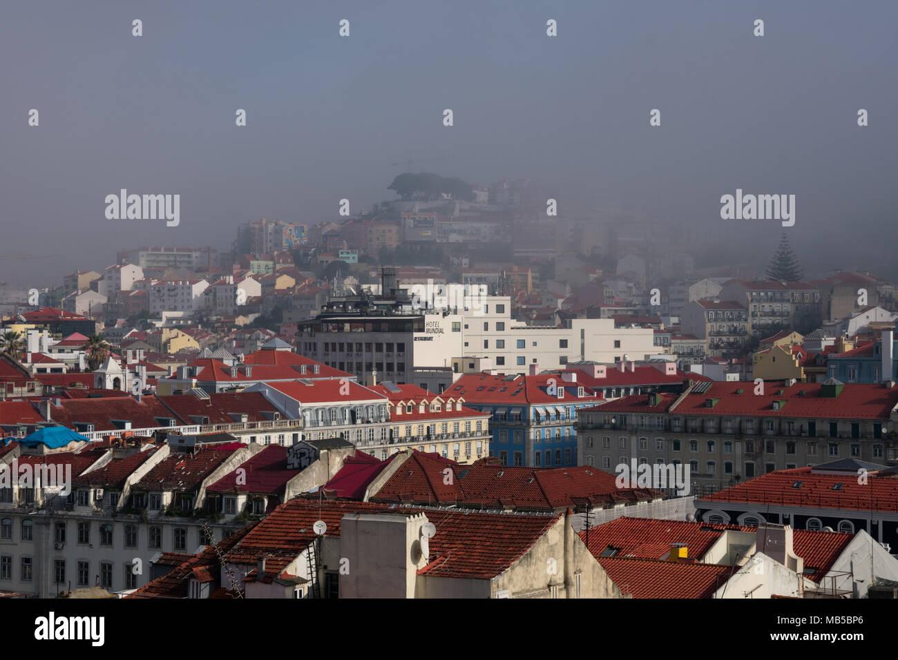 View of Lisbon city on a foggy winter day. Lisbon, Portugal Stock Photo ...