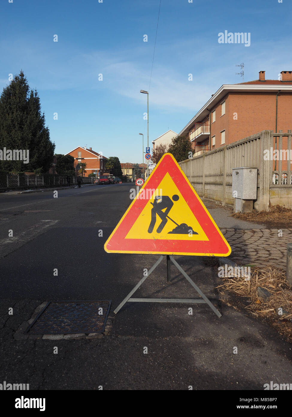Warning signs, men at work road works traffic sign Stock Photo - Alamy