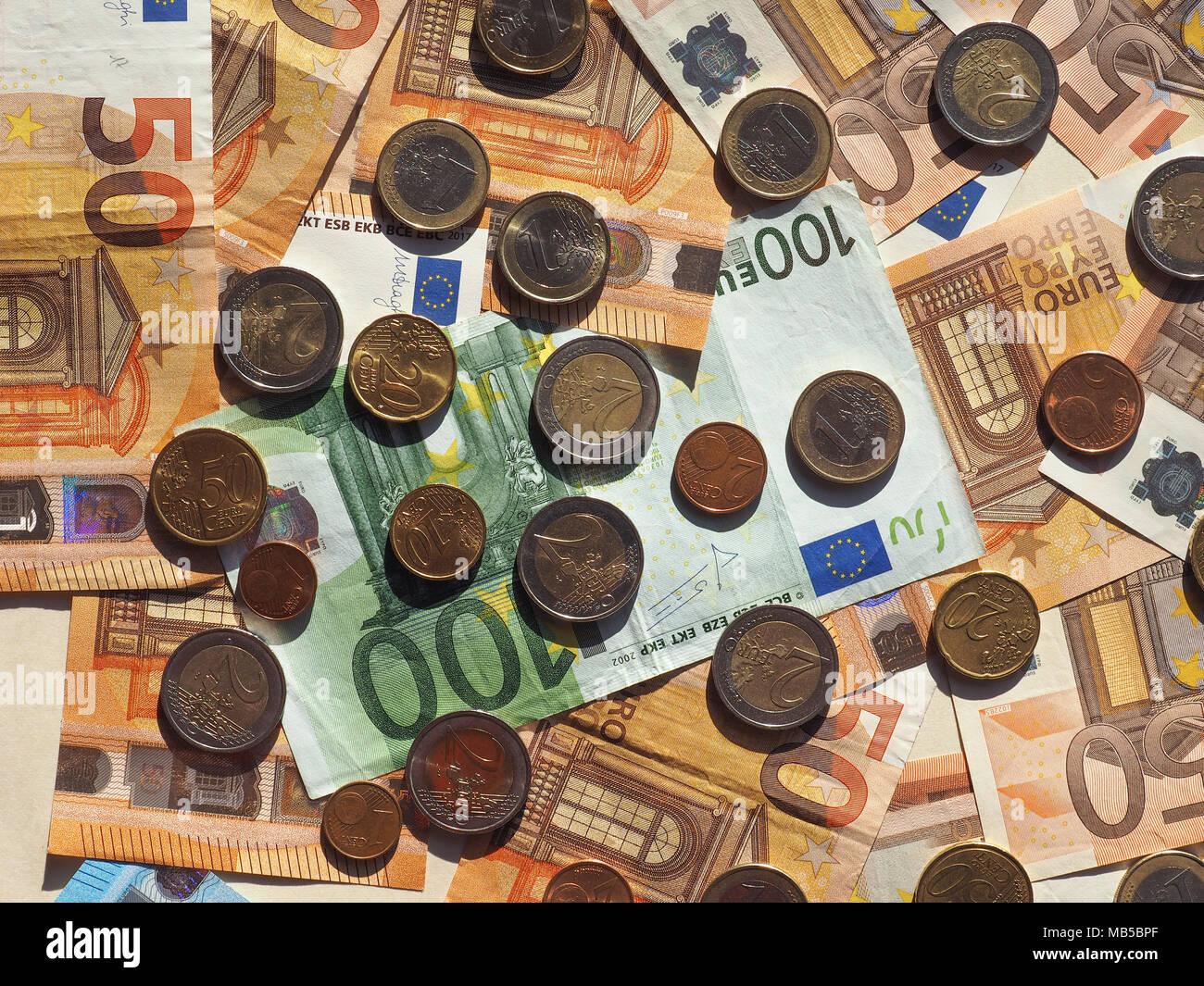 Euro banknotes and coins (EUR), currency of European Union Stock Photo ...