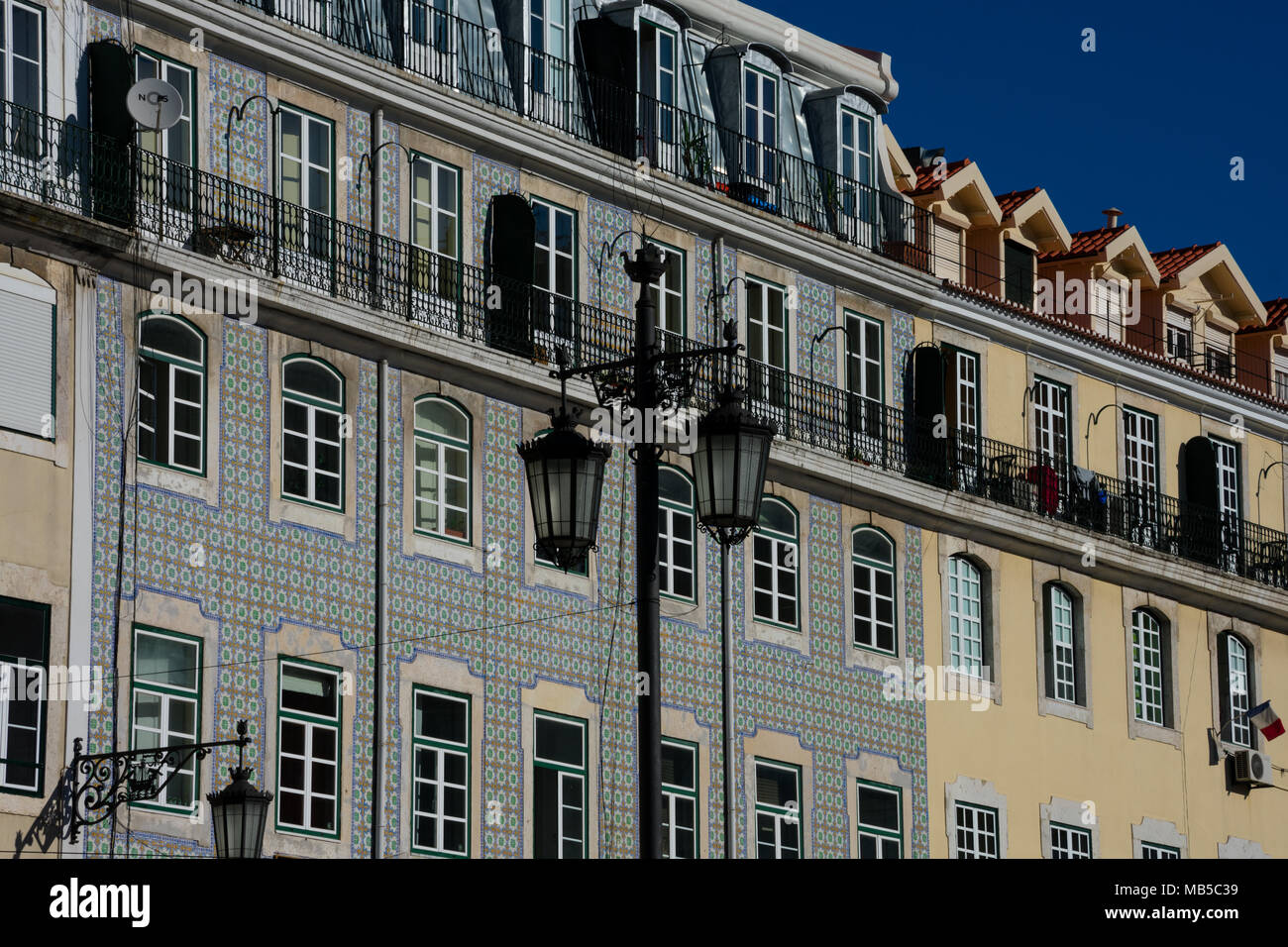 Old building facade with Lisbon traditional tiles. Lisbon, Portugal ...
