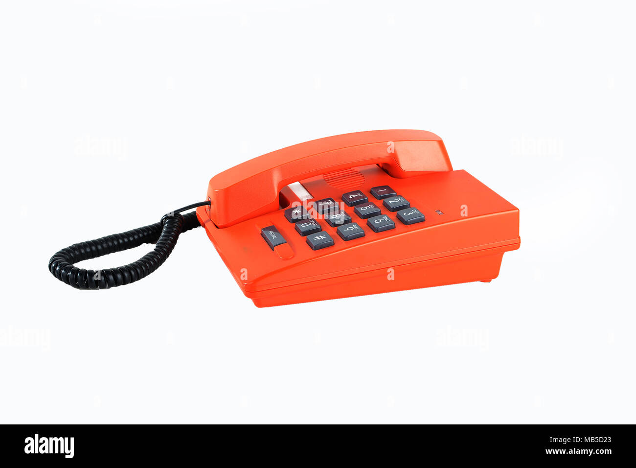 Orange colored telephone on white background Stock Photo - Alamy