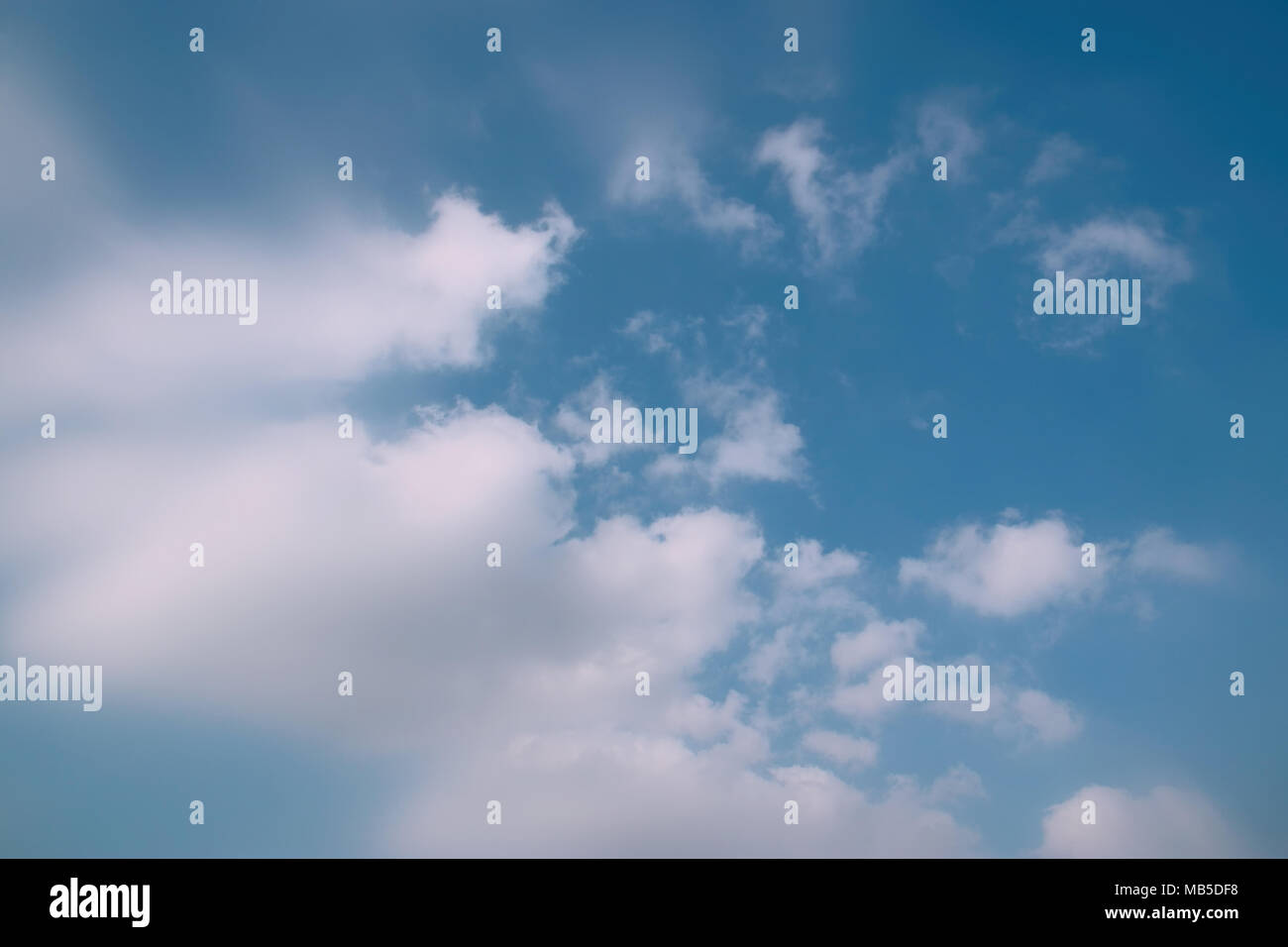 Abstract and bokeh image of sky with clouds. Retro filtered Stock Photo ...