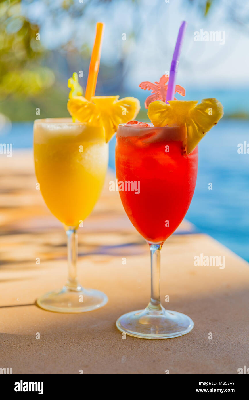 Healthy Mango And Watermelon Juice At Poolside On Sunny Day Stock Photo ...