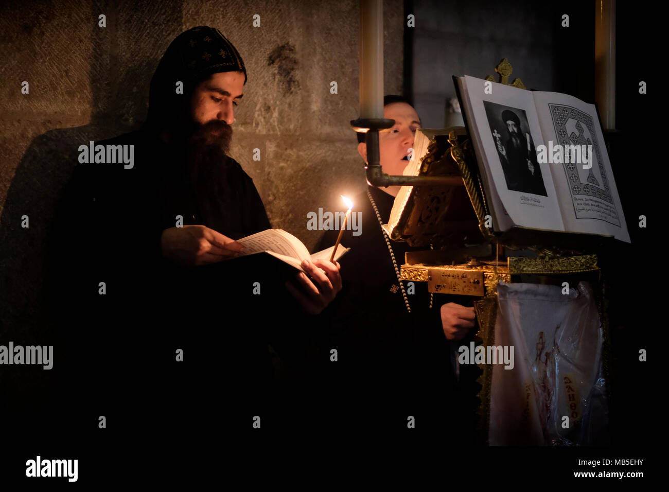Coptic Orthodox priests praying in front of the small Coptic Chapel in ...