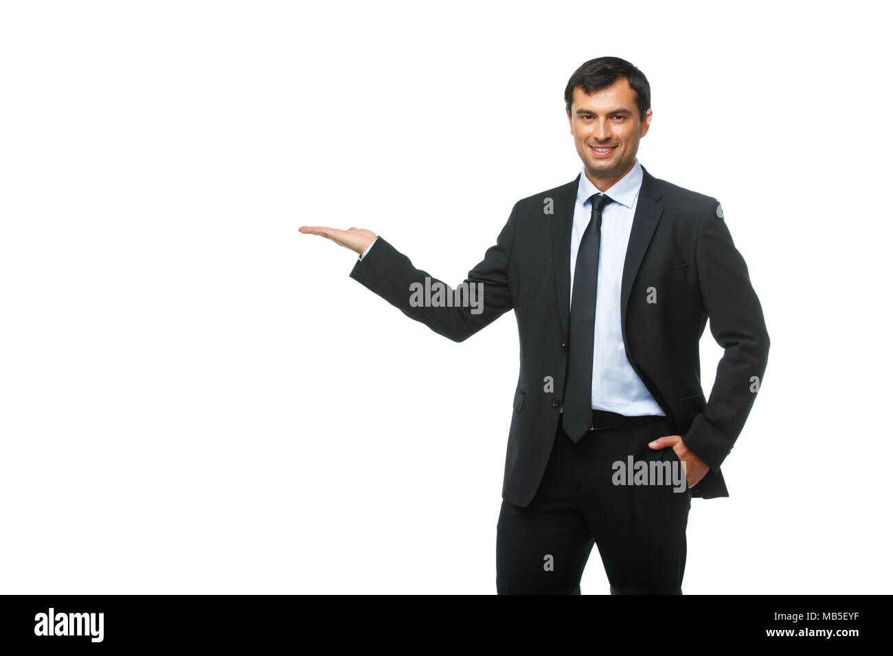 handsome young businessman in business sut, blue shirt and tie. happy ...