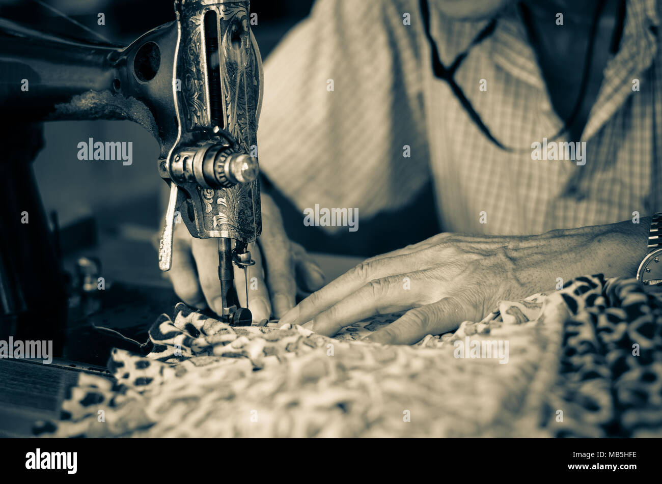 Closeup Sewing Process with old man designer hand,sepia tone Stock ...