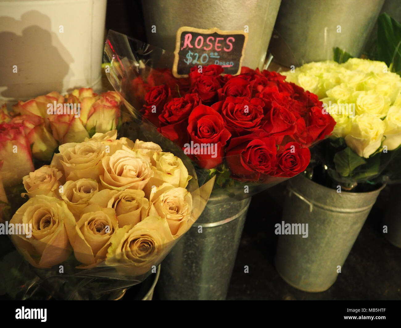 Colorful Roses for sale in a NYC market Stock Photo - Alamy