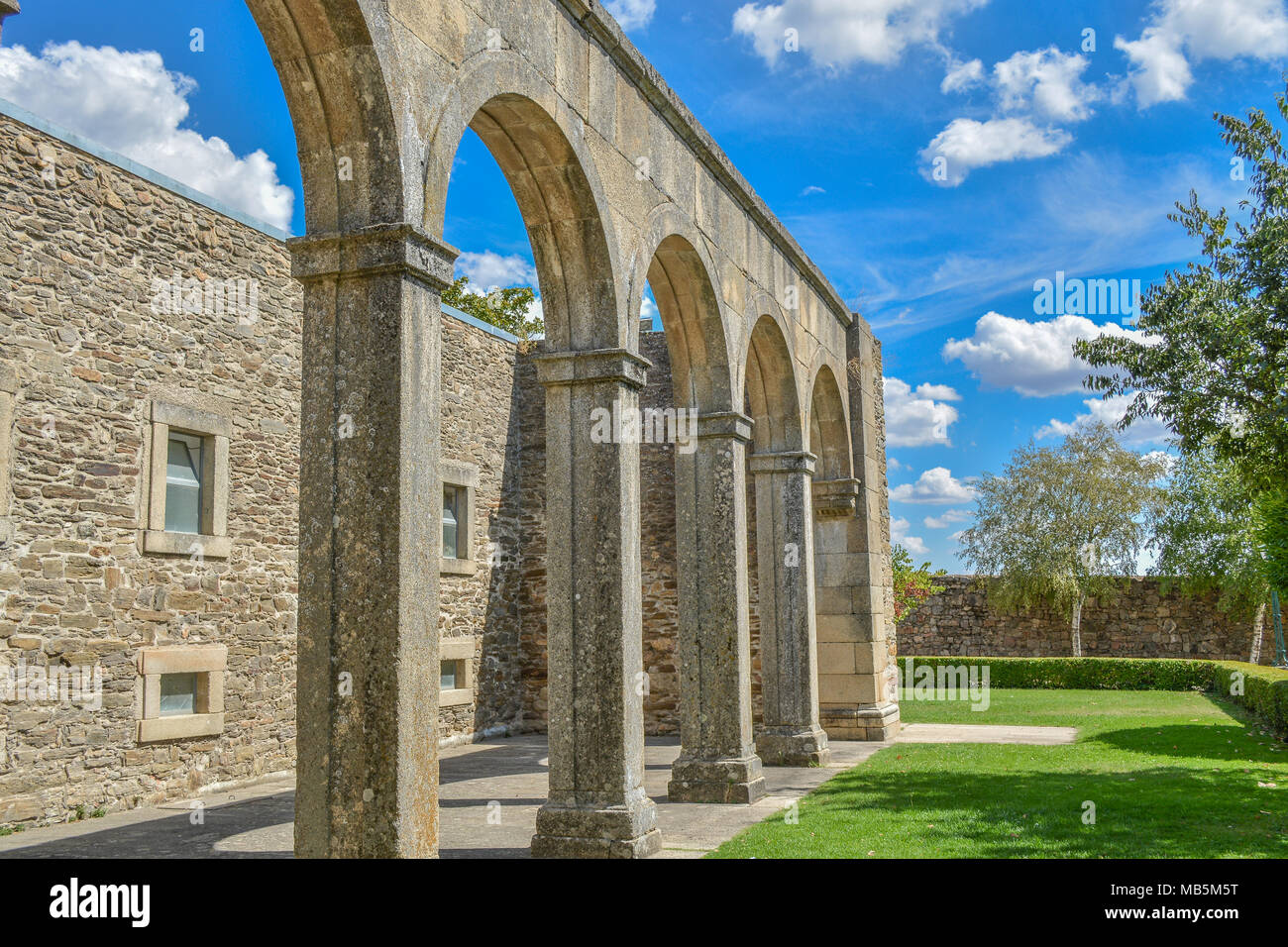 Old Medieval garden with ruins and stone arcades Stock Photo - Alamy