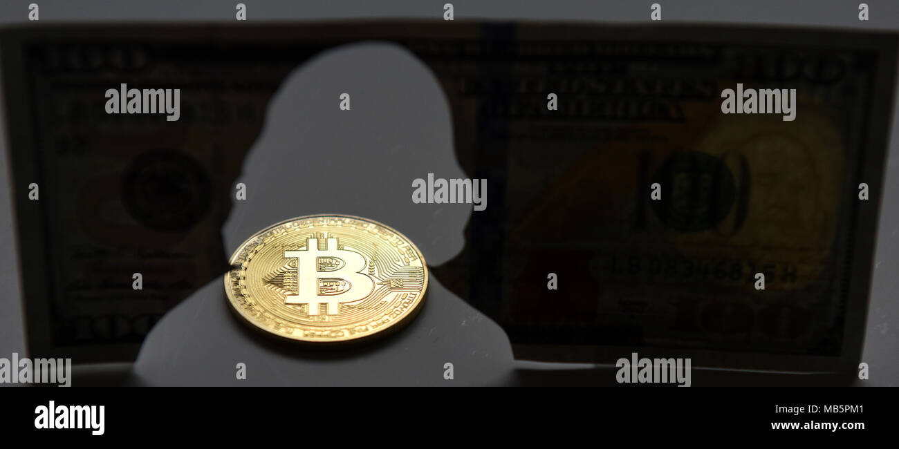 New world currency. Gold coin of Bitcoin and silhouette of Benjamin ...