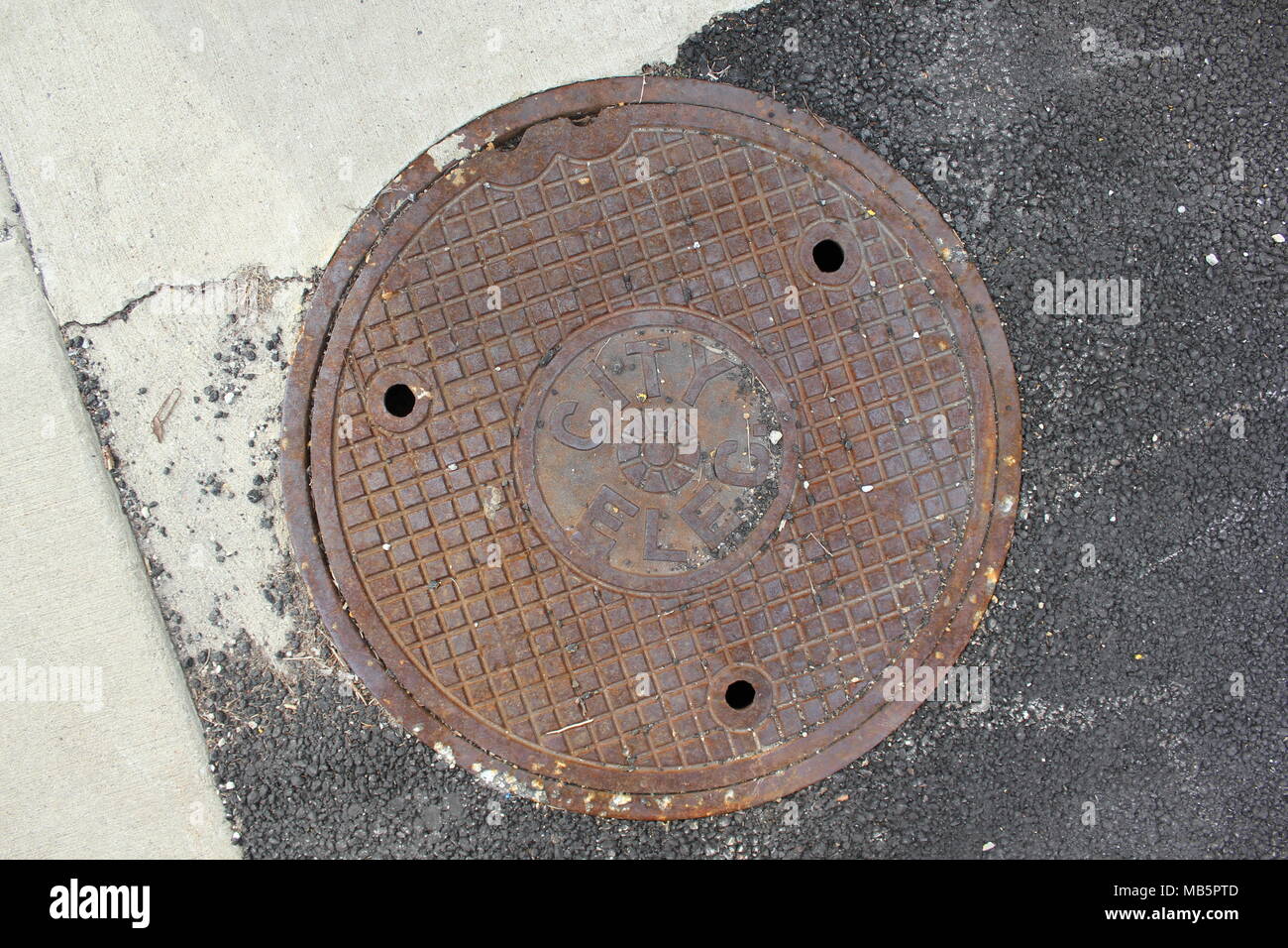 Heavy and strong City of Chicago manhole cover for access to electrical ...