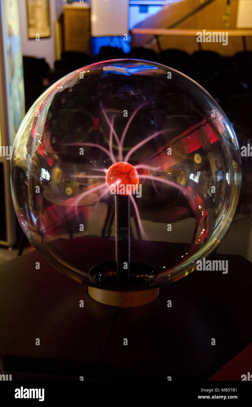 A plasma ball is a glass globe filled with nobel gasses and has an ...
