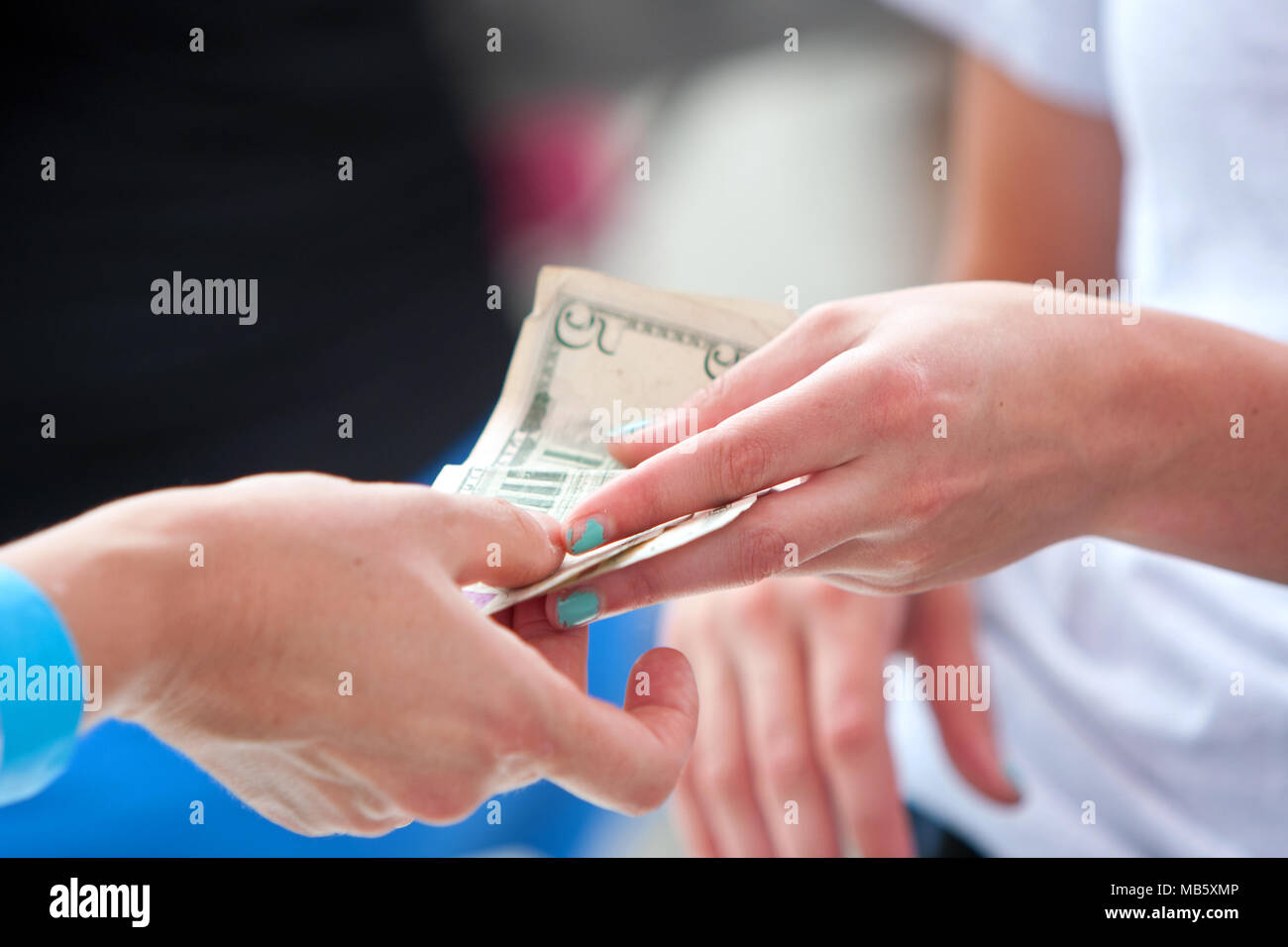 People exchanging money hi-res stock photography and images - Alamy