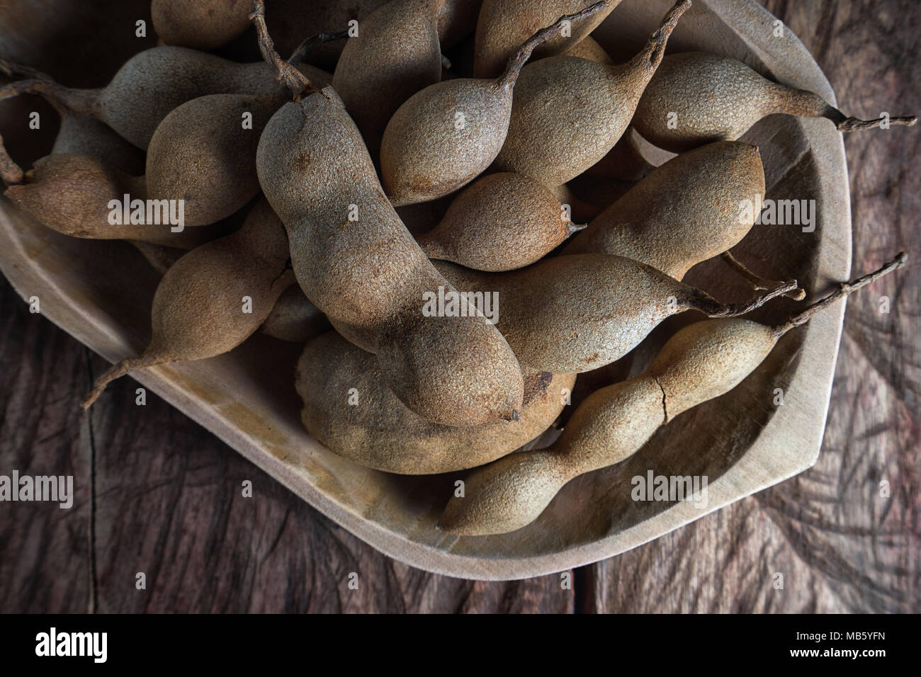 Raw tamarind fruits hi-res stock photography and images - Alamy