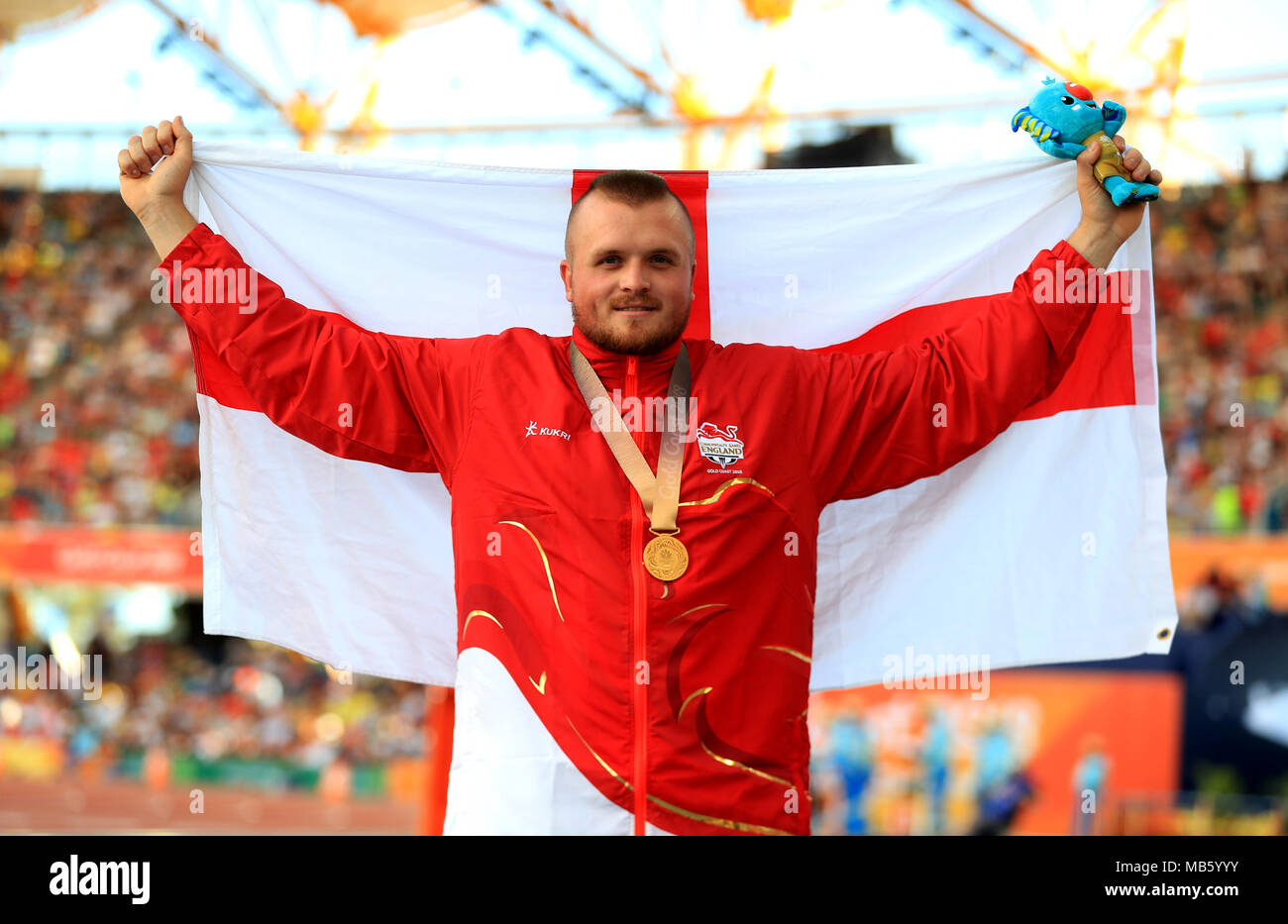 England's Nick Miller celebrates with his gold medal and flag after ...
