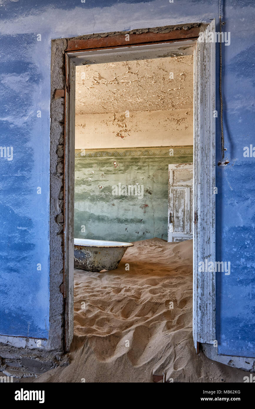 old bathtub in sandy room of Kolmanskop ghost town, Luderitz, Namibia ...