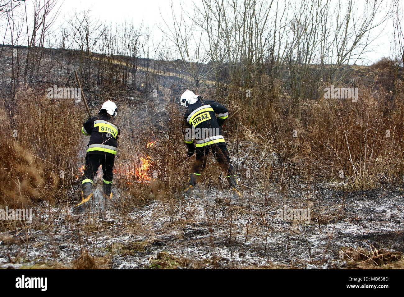 Guard during fire fighting on dry meadows Stock Photo - Alamy