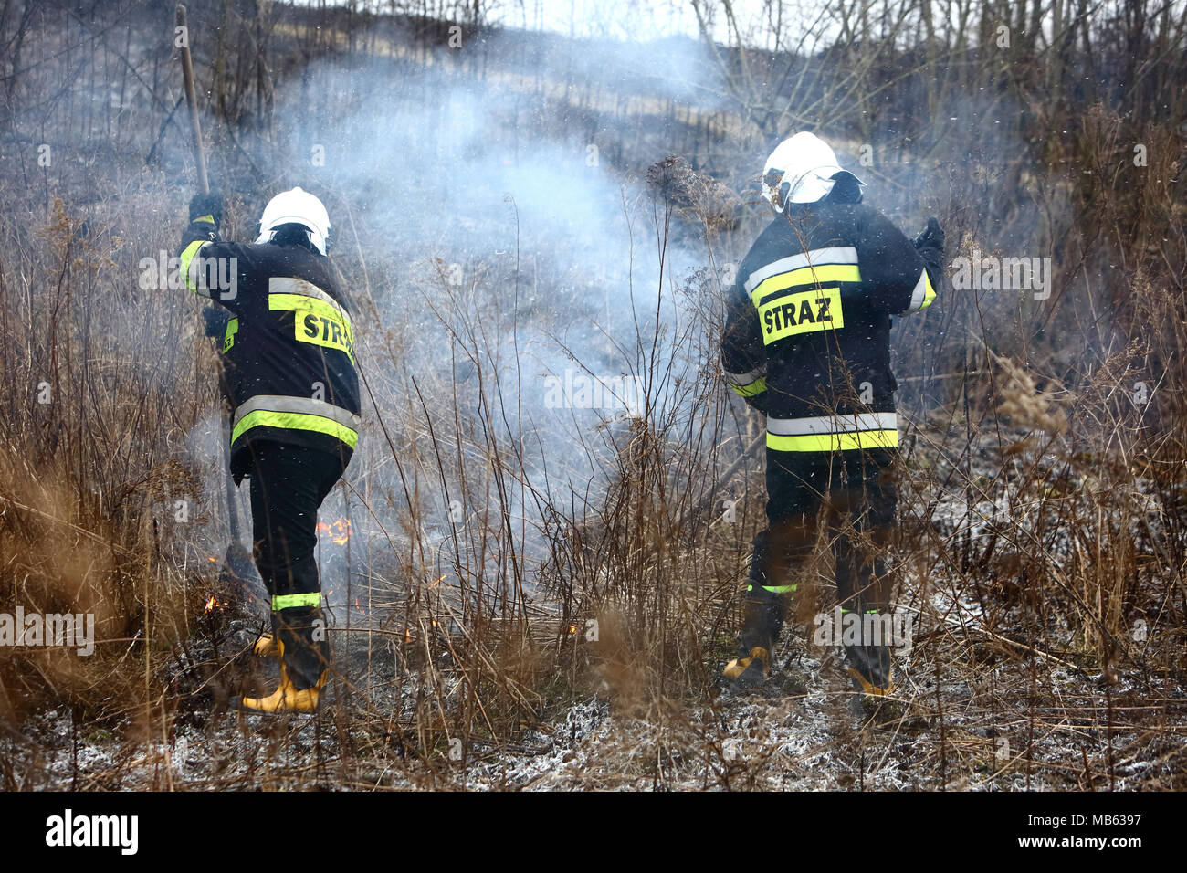 Guard during fire fighting on dry meadows Stock Photo - Alamy